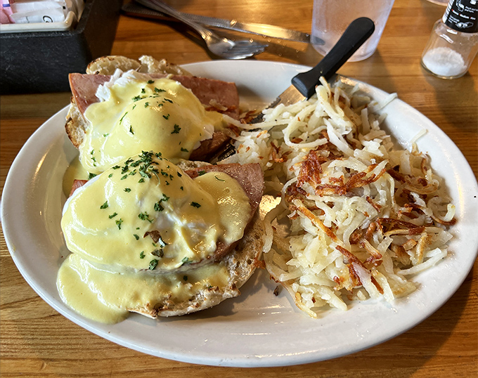 Eggs Benedict: where hollandaise dreams come true. Those crispy hash browns on the side aren't playing supporting actor&mdash;they're co-starring in this breakfast blockbuster.