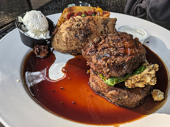 This filet mignon doesn't just sit on the plate&mdash;it commands attention with a rich sauce pool that practically begs for a bread-sopping intervention.