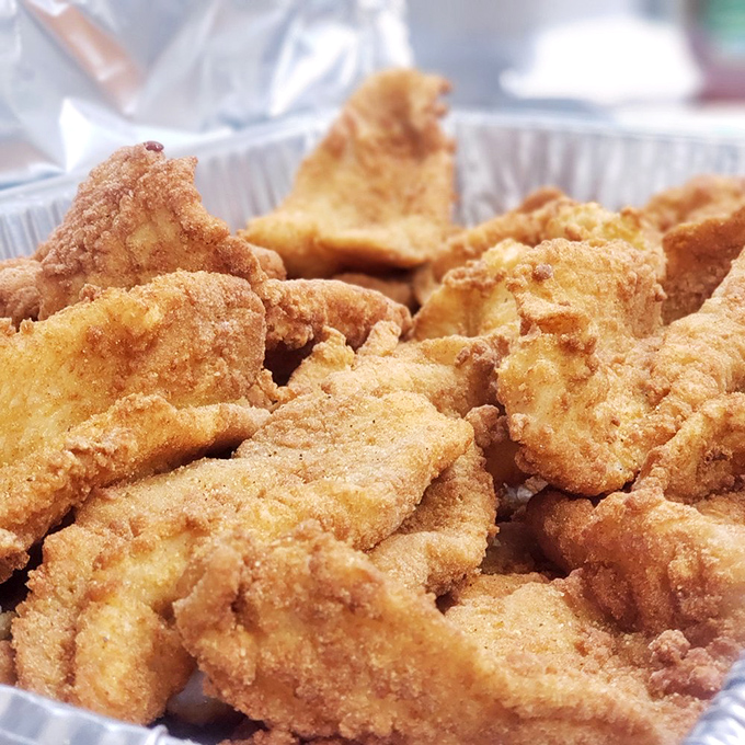 Golden-fried perfection that makes fish enthusiasts weak at the knees. Each crispy morsel tells the story of generations of Southern frying expertise.