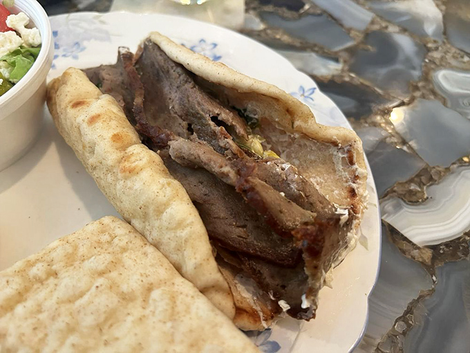 This isn't fast food—it's slow food served quickly. Tender gyro meat nestled in pillowy pita with a side of cultural heritage.