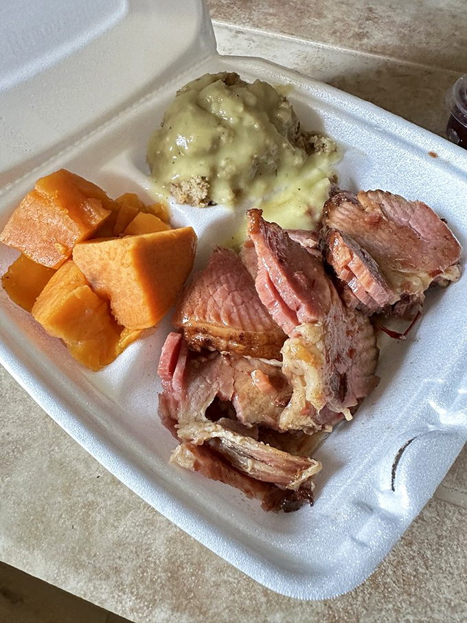 Ham that's been treated with respect, sweet potatoes that melt in your mouth, and dressing that could make a grown person weep with joy.