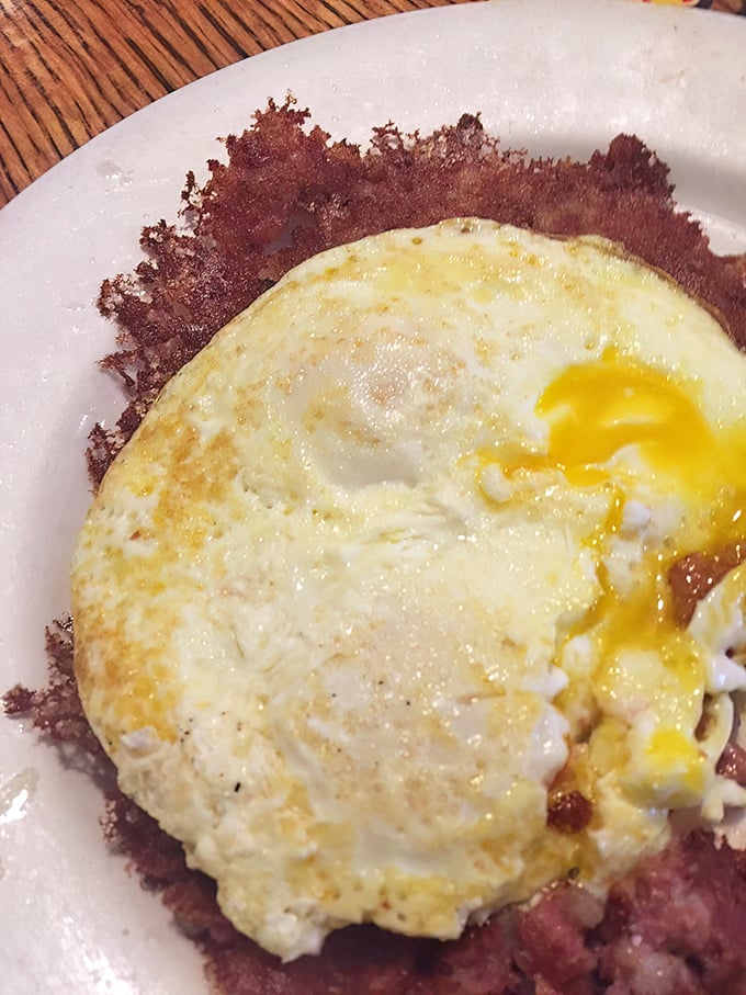 That perfect sunny-side up egg perched atop a crispy foundation of hash browns is breakfast's version of the Sistine Chapel ceiling.