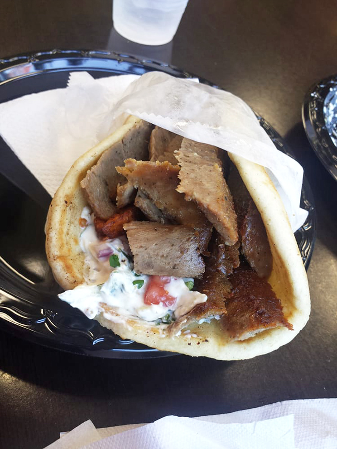 Behold the lamb gyro in all its glory &ndash; tender, seasoned meat nestled in a pillowy pita with tzatziki that's worth crossing state lines for.