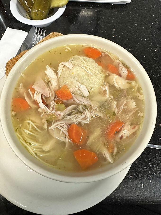 Chicken soup with matzo balls isn't just food&mdash;it's penicillin with personality. Look at those chunks of chicken and carrots swimming in liquid gold!