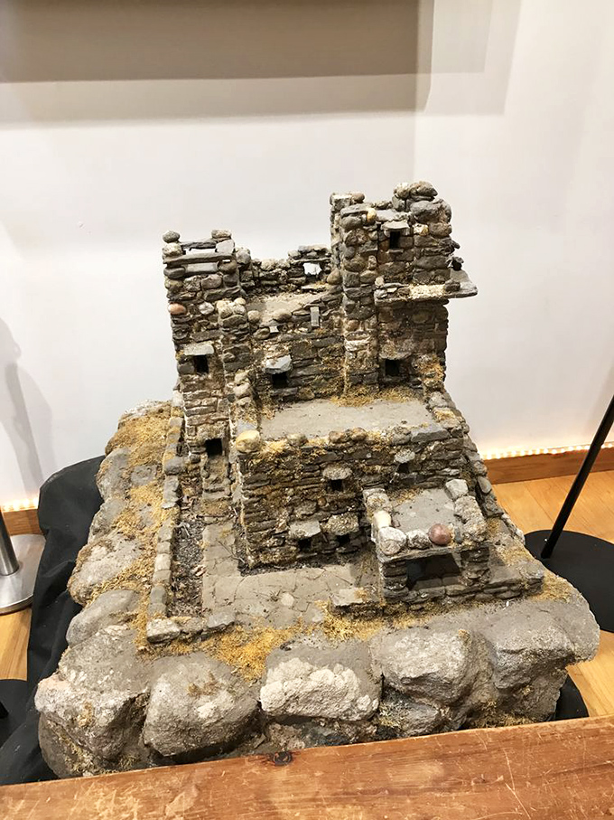 This miniature model reveals the castle's intricate design &ndash; proof that even great castles start small, like architectural dreams sketched on napkins.