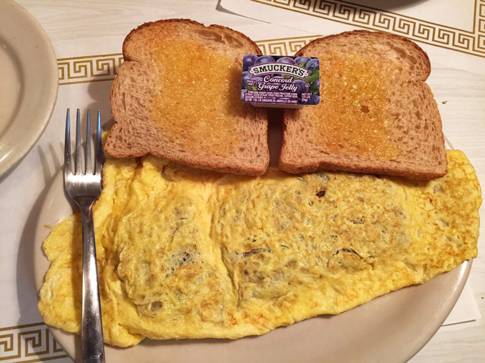 Behold the omelet that launched a thousand satisfied sighs, perfectly folded and ready to rescue you from hunger's stormy seas.