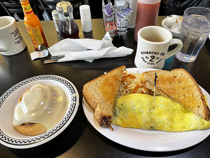 Breakfast architecture at its finest&mdash;a fluffy omelet that somehow defies physics, paired with hash browns that achieved the perfect crisp-to-tender ratio.