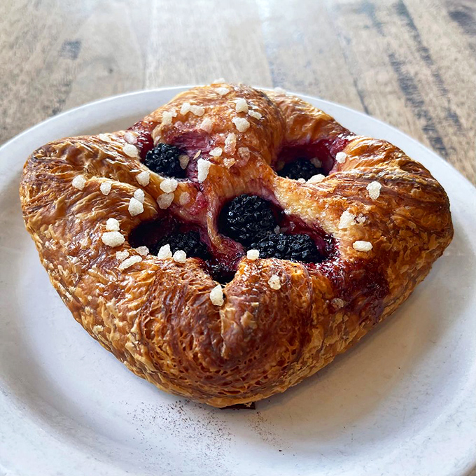 This isn't just a croissant&mdash;it's a butter-based religious experience. The burnished exterior shatters like delicate glass protecting treasure within.