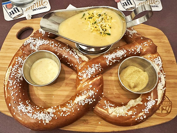 Pretzel perfection! Golden-brown, salt-kissed dough served with beer cheese that could make a grown person weep with joy.