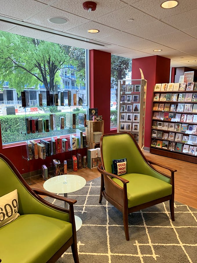 Those lime green reading chairs aren't just furniture—they're portals to other worlds with the perfect view of North Carolina greenery outside.