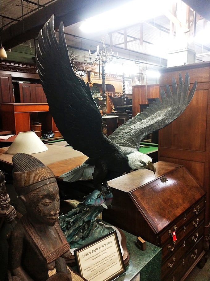 The eagle has landed... on a display table! This majestic bronze sculpture soars above the sea of antiques, making a statement grandma's ceramic owl collection never could.