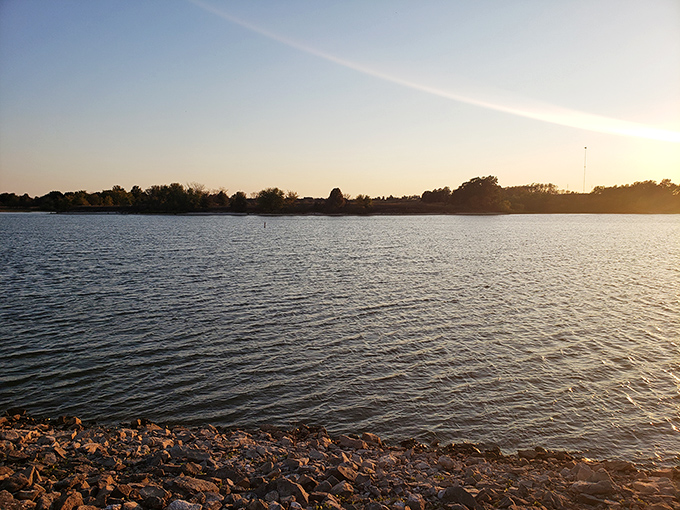 Twilight at Long Branch casts a spell over the shoreline, turning ordinary rocks into jewels. The water whispers secrets only sunset visitors get to hear.