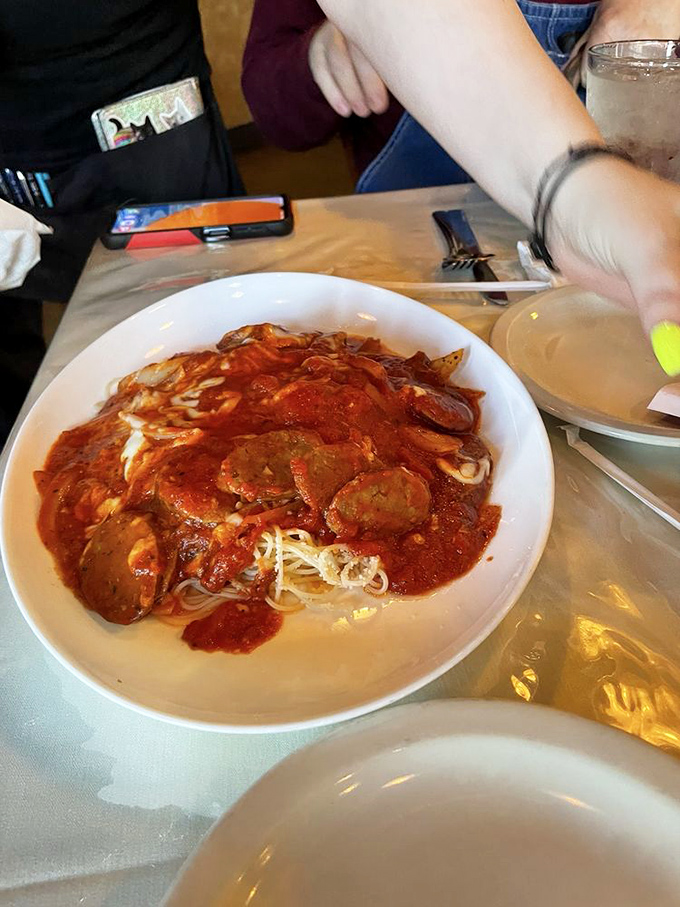 This spaghetti isn't just topped with sauce&mdash;it's having a passionate love affair with it. The kind Italian opera composers write about. 