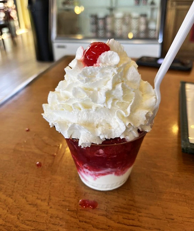 Behold, the strawberry sundae in all its glory! It's like summer decided to throw a party in a glass and invited all your childhood dreams.