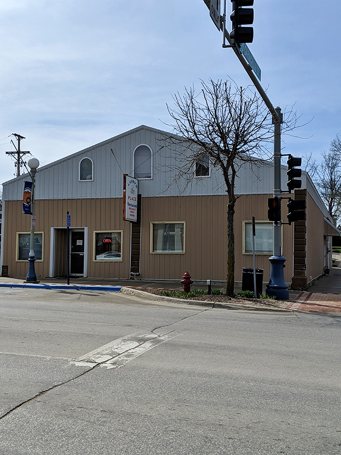 Larry's Place doesn't need fancy architecture to win hearts—just honest cooking. This unassuming exterior hides flavor bombs waiting to explode.