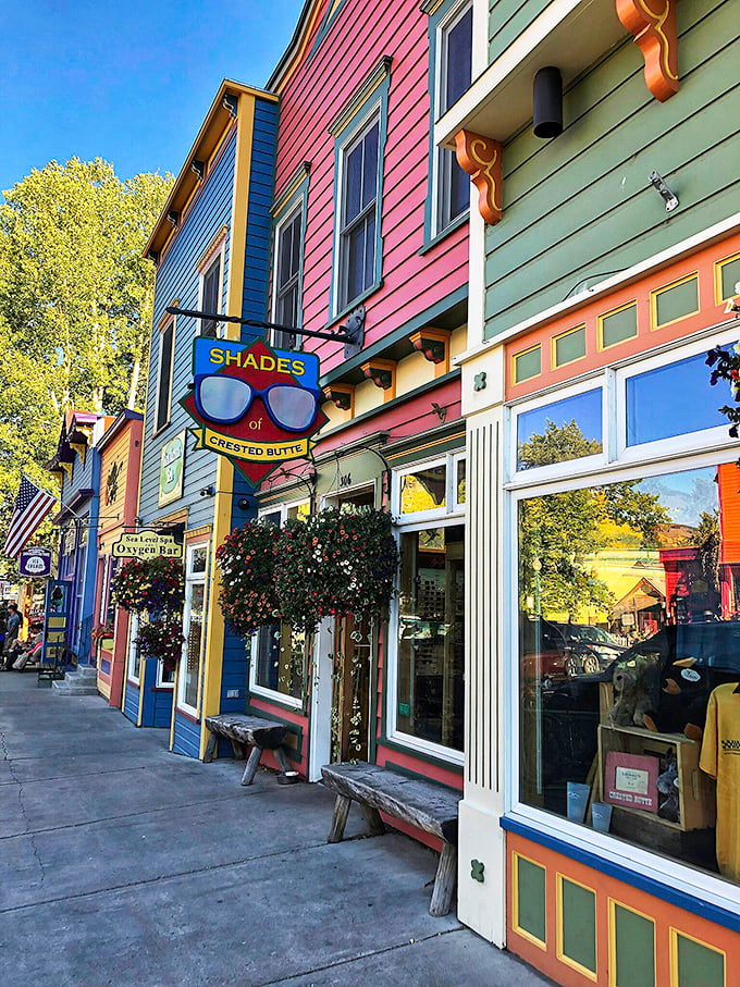 Crested Butte's rainbow-colored storefronts make even sunglasses shops pop – a town that refuses to be anything but cheerful.