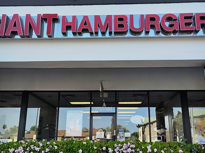 "Giant Hamburgers" isn't just a name&mdash;it's a mission statement. This unassuming storefront houses burgers that require both hands and a strategy.