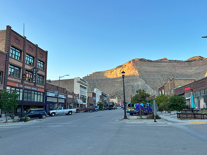 Helper's historic Main Street whispers stories of the Old West while mountains stand guard in the background.