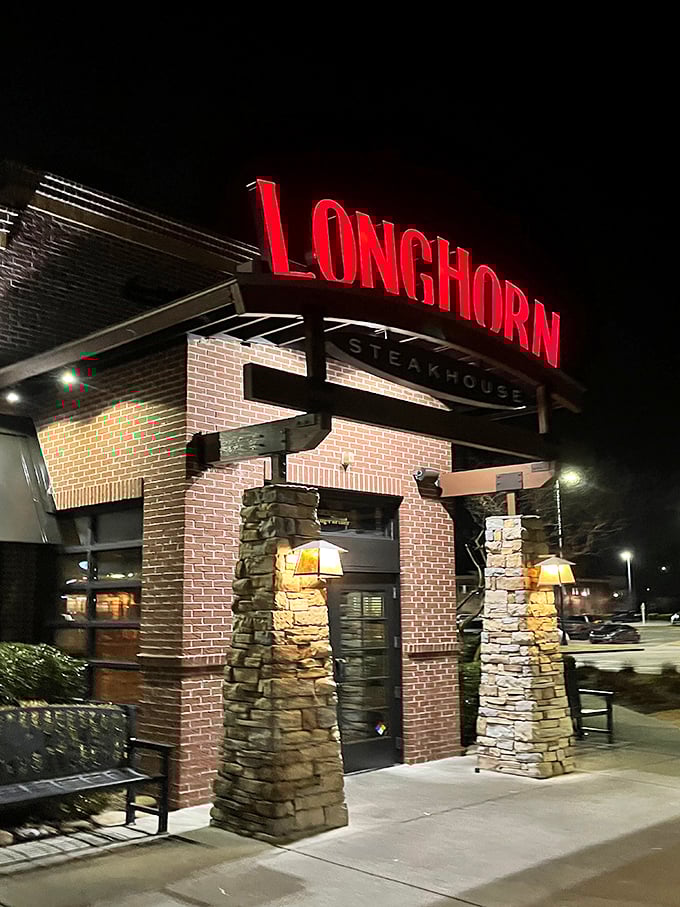 LongHorn's glowing sign at dusk is like a lighthouse for the steak-starved, guiding hungry souls to beefy salvation.