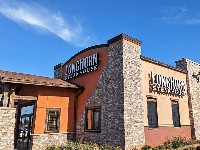 LongHorn's stone and orange exterior stands like a beef beacon&mdash;calling hungry travelers with promises of perfectly seared protein.