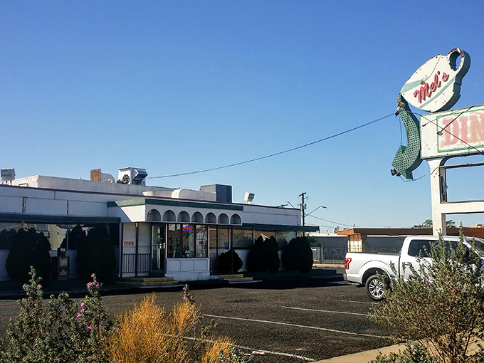 Mel's Diner: That iconic coffee cup sign isn't just decoration – it's a beacon of hope for the caffeine-deprived.