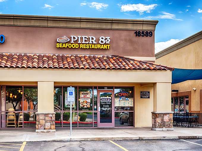 Oscar's Pier 83 brings boardwalk vibes to strip mall life. That red-tiled roof houses fish so fresh you'll forget you're in a desert state.