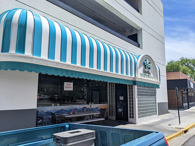 Peg's blue-and-white awning signals breakfast paradise – like spotting an oasis in a desert of ordinary morning meals.