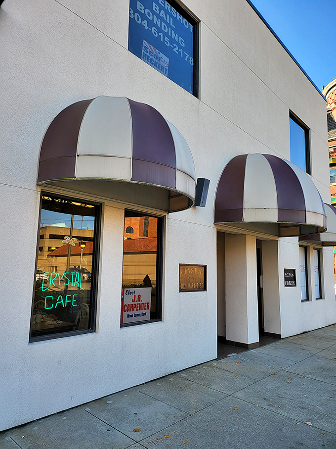 The Crystal Cafe's distinctive purple and white awnings stand out like royalty. This unassuming breakfast palace doesn't need fancy frills.
