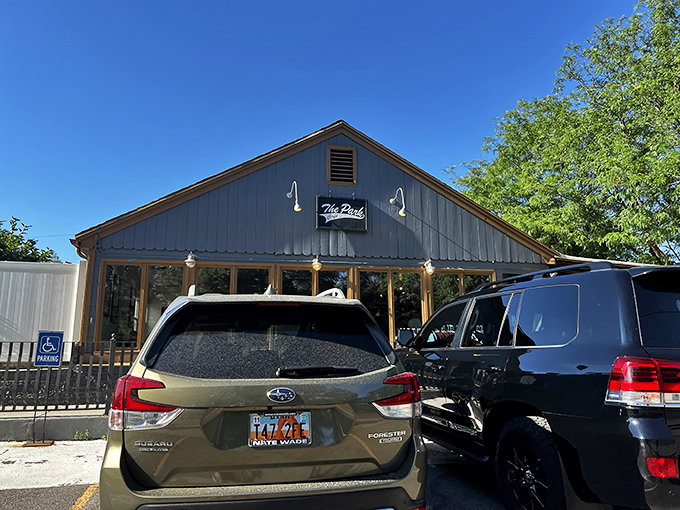 The Park Cafe's rustic charm might look unassuming, but those packed parking spots tell the real story - food worth fighting for!