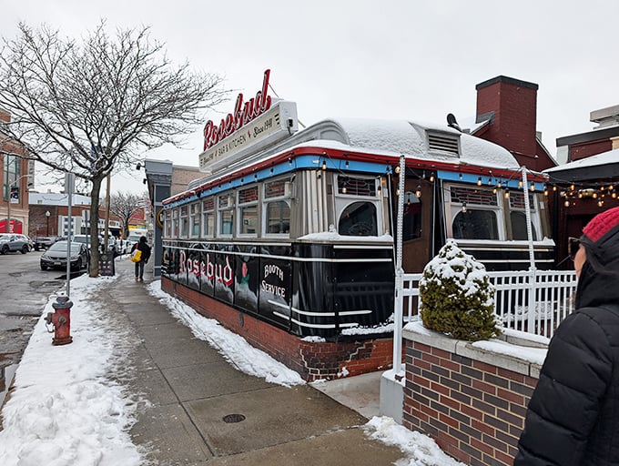 Rosebud's gleaming vintage diner car wears a blanket of snow like a dessert topped with powdered sugar, inviting winter warriors inside.