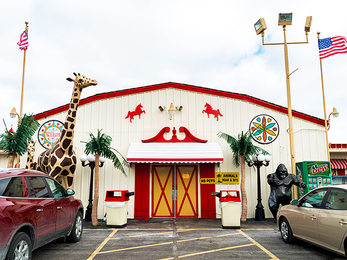 Traders World greets you with a giraffe statue that seems to say, "Yes, we have everything... including kitchen sinks!"