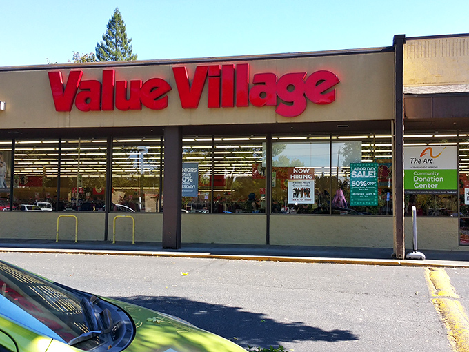 Value Village stretches wide across the parking lot, a treasure chest disguised as a humble strip mall tenant. 