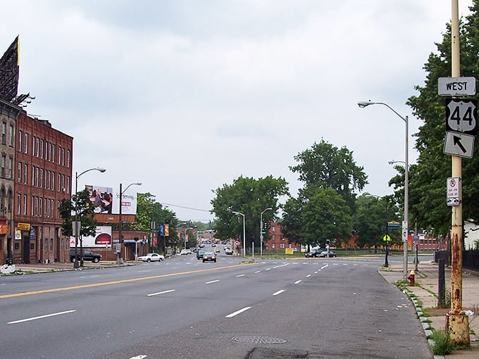 West Hartford's vibrant downtown street scene offers a glimpse of its walkable charm, where local shops beckon visitors.