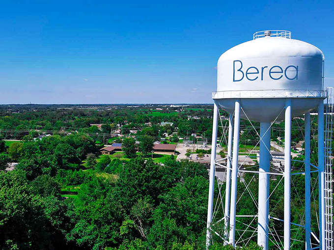 The iconic Berea water tower stands sentinel over a town where artists thrive and retirees discover their dollars have unexpected superpowers.