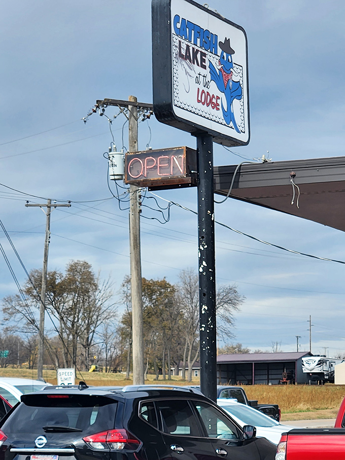 The "OPEN" sign glows like a beacon for seafood lovers seeking authentic catfish in the heart of the Midwest.