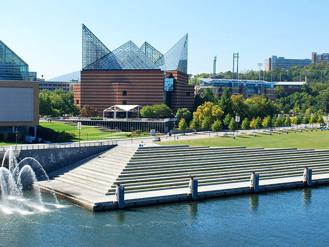 The Tennessee Aquarium's distinctive glass peaks stand out in Chattanooga's skyline like geometric mountains made of pure imagination.