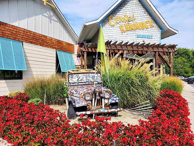 An old Jeep blooms with personality outside Crooked Hammock, where beach vibes and brewery culture create the perfect staycation atmosphere.