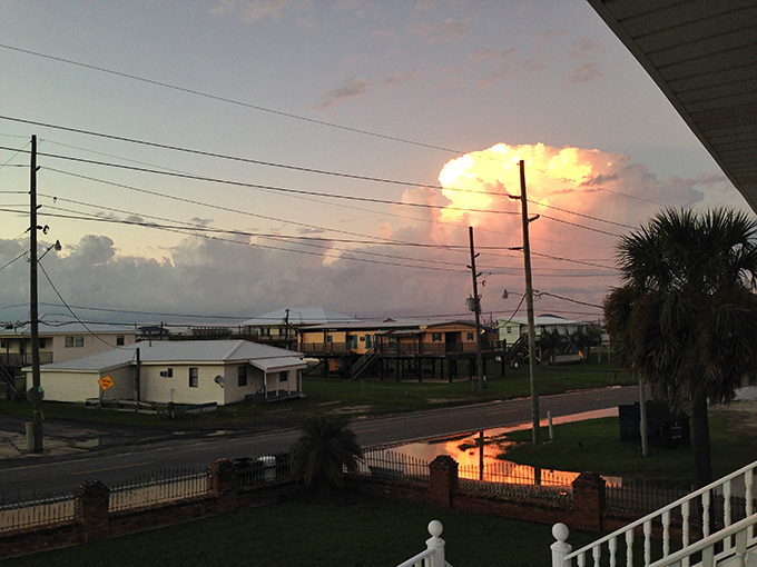 Sunset skies paint Grand Isle in golden hues, proving that sometimes the most magical spots are at the very edge of the map.