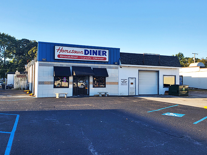 The checkered pattern running along this diner hints at the classic American food waiting just beyond those doors.
