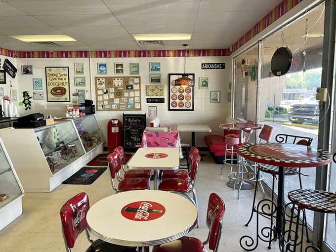 Step inside this time capsule of diner-style charm, where Coca-Cola tables and vintage decor make calories count as a cultural experience.