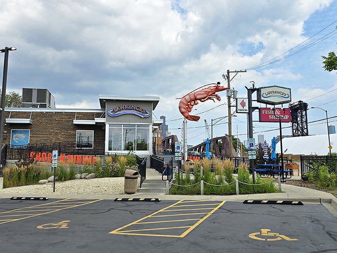 That massive red shrimp isn't just decoration—it's a promise of deliciousness. Lawrence's modern building houses old-school fried seafood magic.