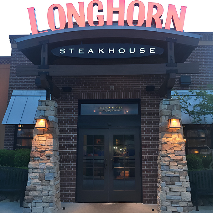 Stone pillars and that iconic sign&mdash;LongHorn doesn't need to shout about its steaks. The architecture does the talking.