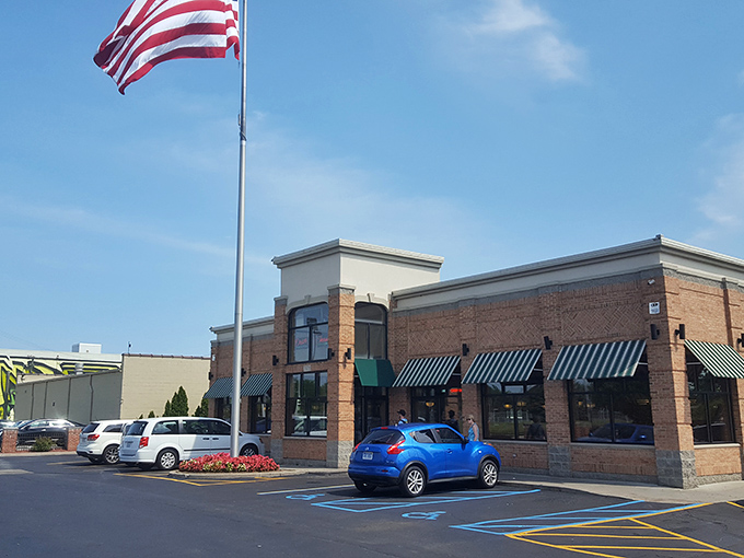 The American flag flies proudly outside Louie's, where Detroit's finest corned beef has been bringing people together for generations.