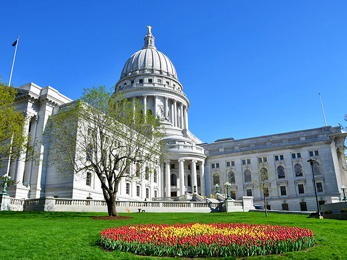 Madison's skyline embraces its lakes like old friends, creating that "wish you were here" postcard moment. 