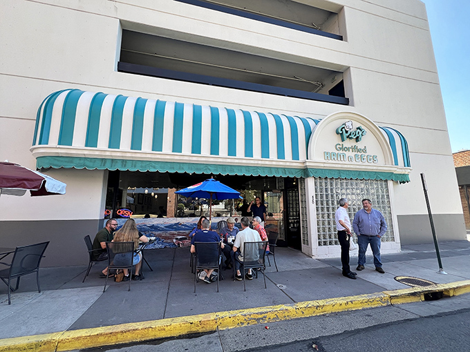 The patio at Peg's Glorified Ham n Eggs – where breakfast conversations flow as freely as the coffee.