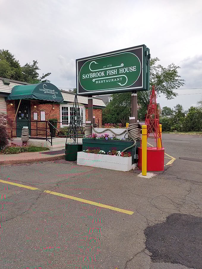 The green sign promises seafood excellence, and the kitchen delivers. Saybrook Fish House knows that fresh fish needs no fancy introduction.
