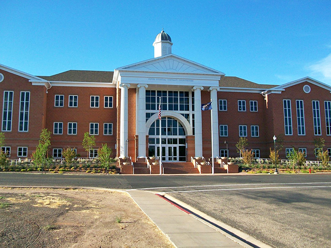 This red-brick building in St. George exudes small-town charm and history. Affordable living with a side of architectural character!