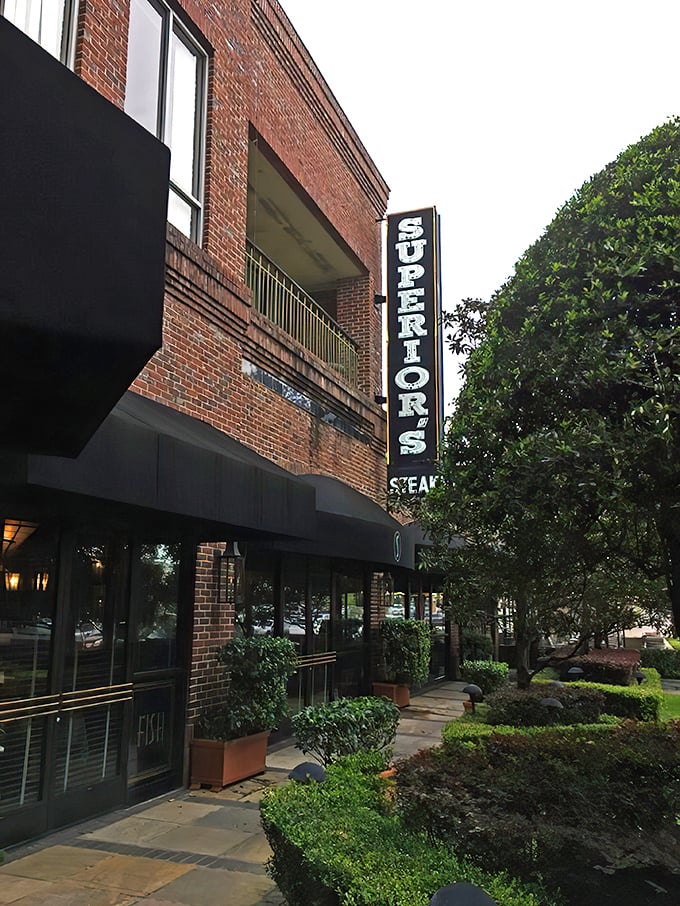 Superior's vertical sign guides meat lovers like a carnivorous lighthouse. Follow it to tender, juicy salvation.