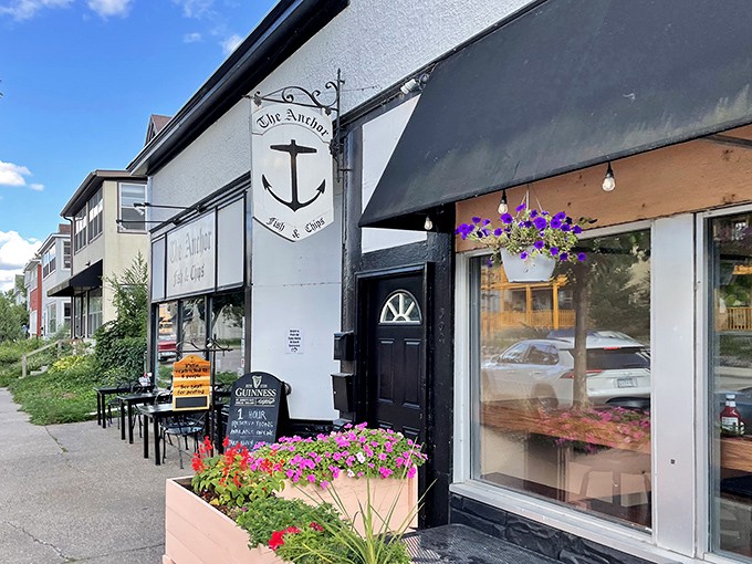 Those hanging flowers outside The Anchor aren't just pretty&mdash;they're a promise that something lovingly crafted awaits inside. British comfort with Minnesota charm.