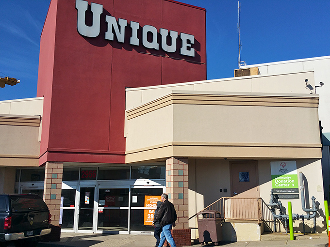 A shopper approaches Unique Thrift's entrance, about to embark on a thrifting adventure. The anticipation is like Christmas morning!